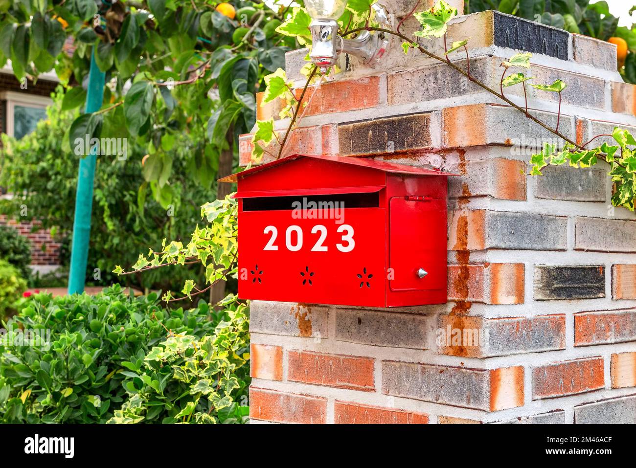 The mailbox in front of the house with 2023 on it Stock Photo - Alamy