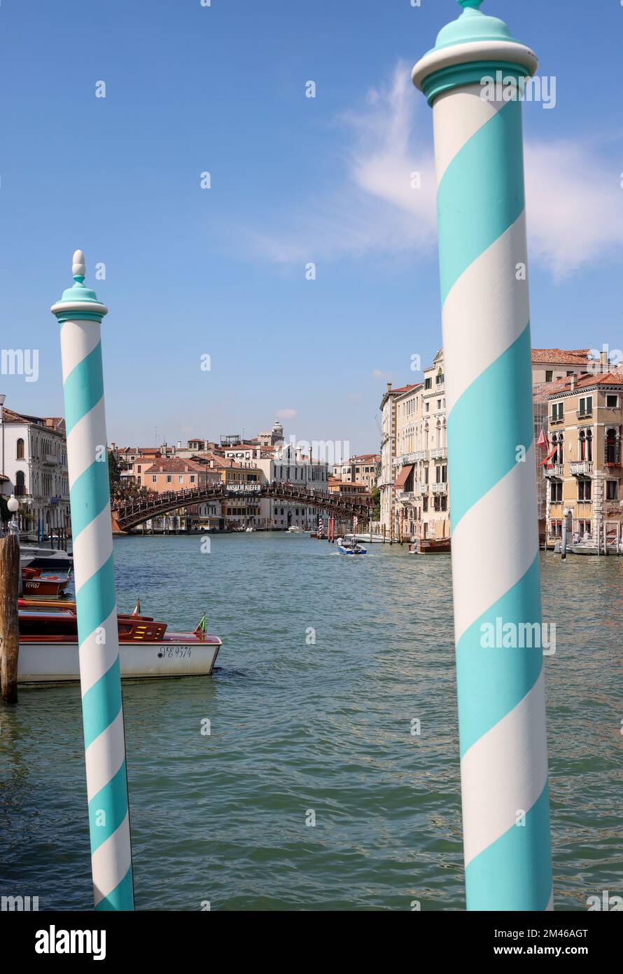 Venice, Italy - September 5, 2022: Blue and white wooden mooring pole ...
