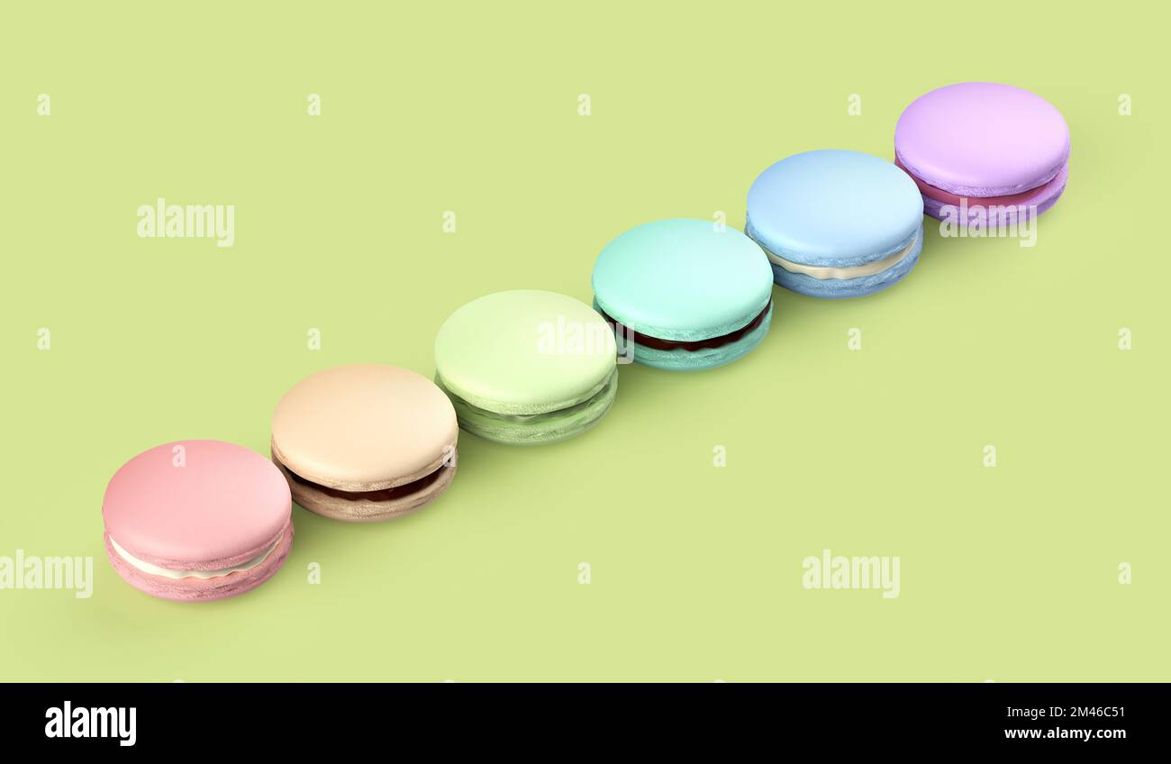 Six french macarons with different colors and flavors on green ...