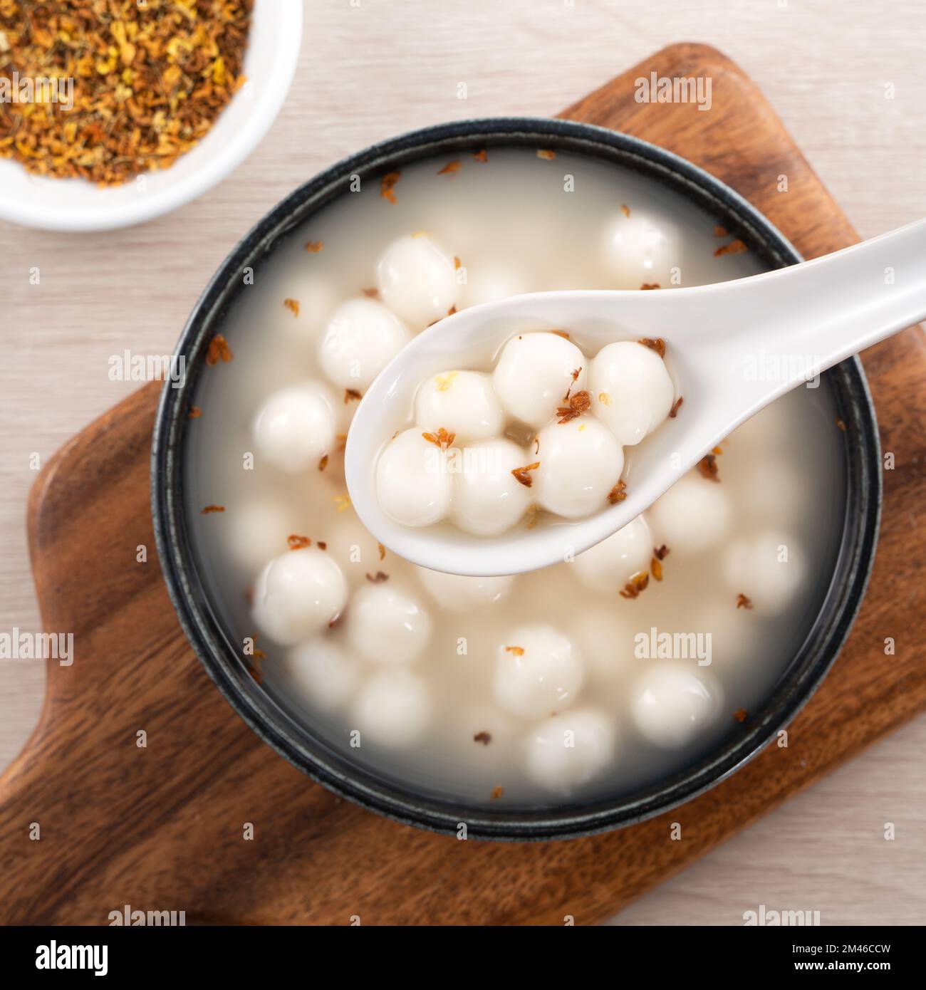 Little white tangyuan (tang yuan, glutinous rice dumpling balls) with ...