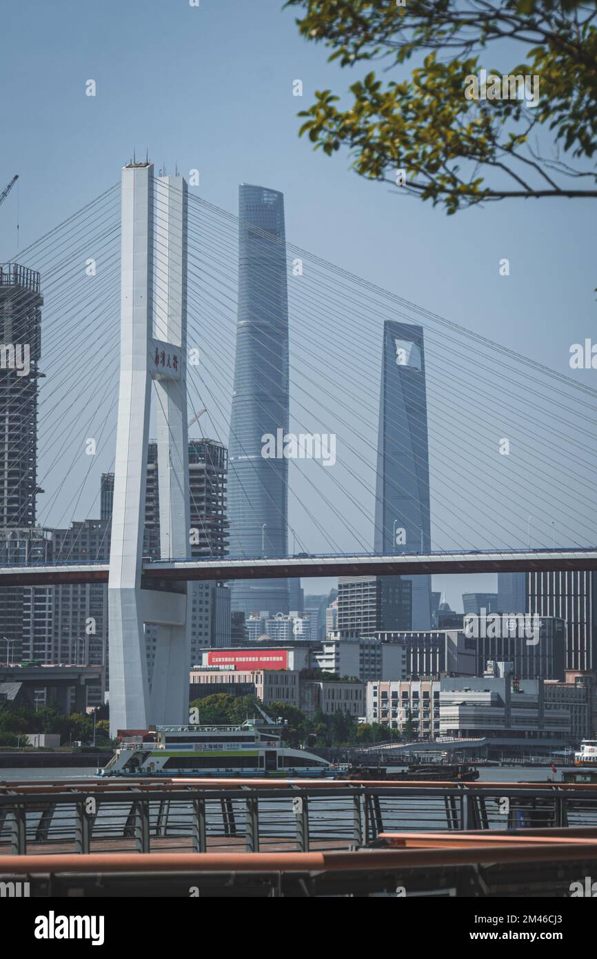 A vertical of the tourist attraction NanPu bridge in Shanghai, China ...