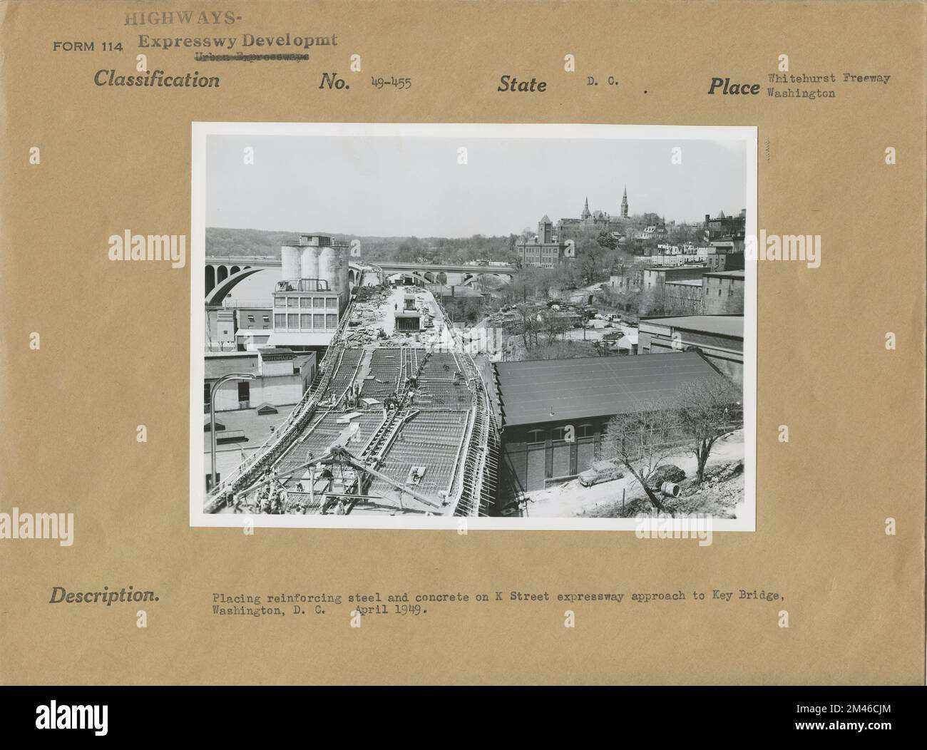 K Street Expressway Approach to Key Bridge. Original caption: Placing ...
