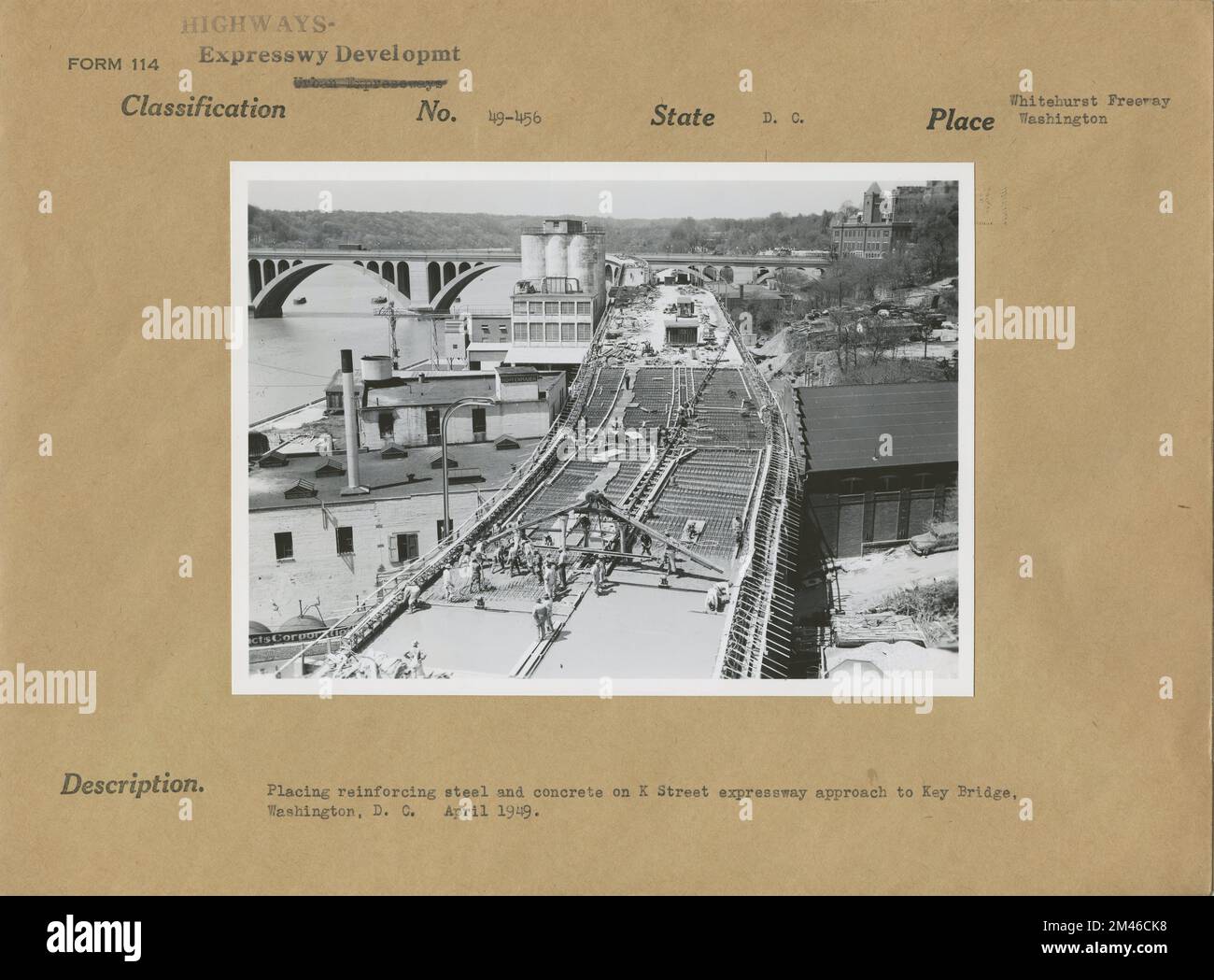 K Street Expressway Approach to Key Bridge. Original caption: Placing ...