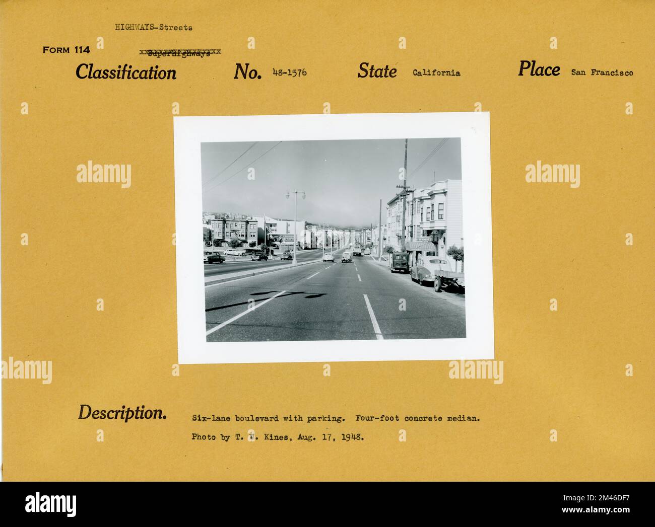 Six lane boulevard with parking. Original caption: Six lane boulevard ...