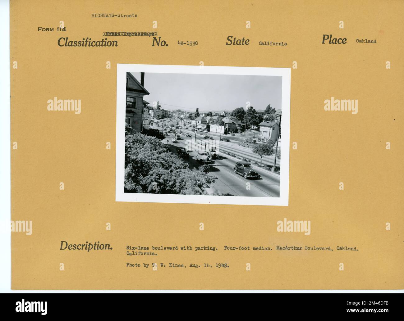 Six lane boulevard with parking. Original caption: Six lane boulevard ...