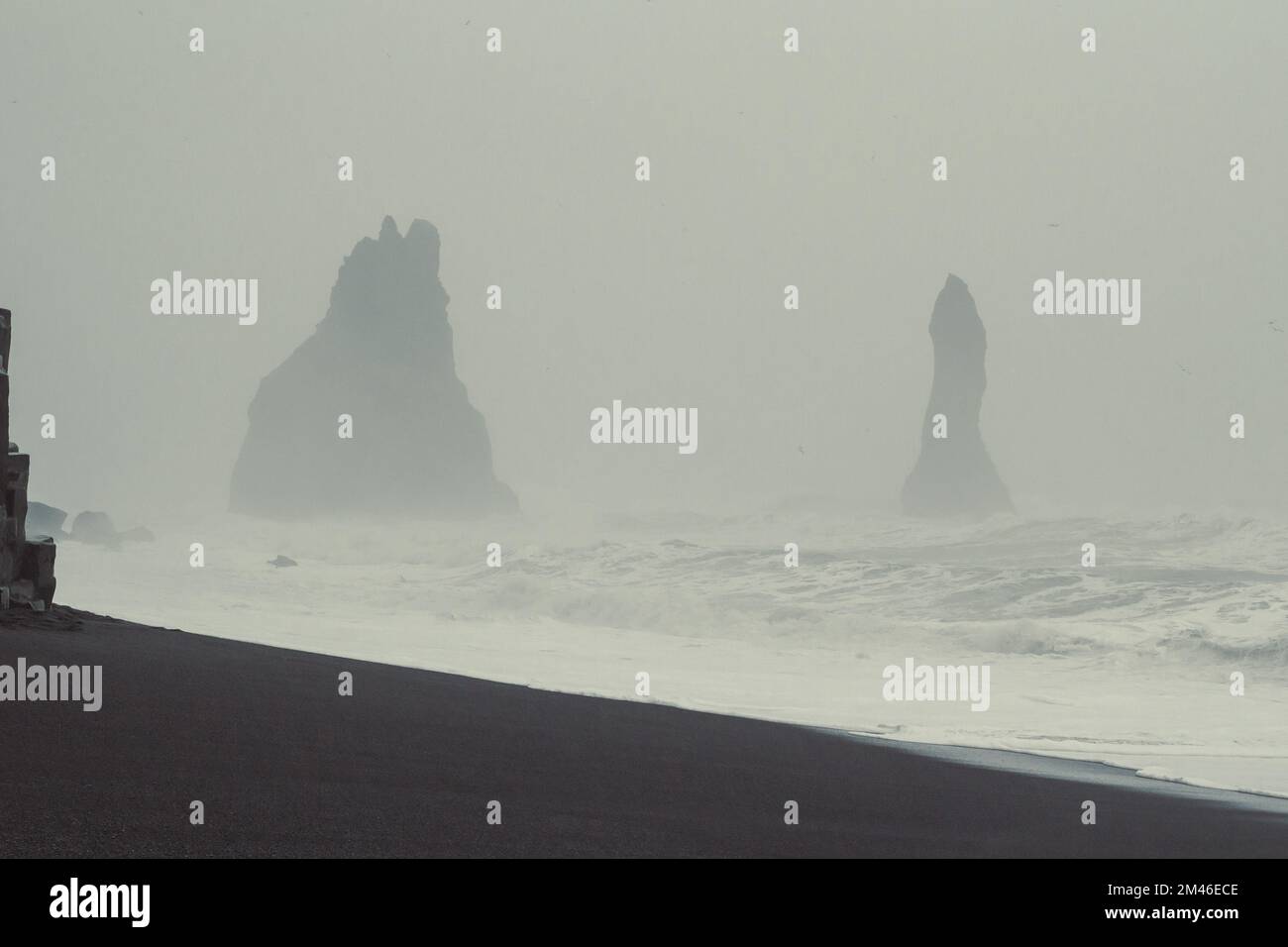 Reynisdrangar beach cliffs landscape photo Stock Photo - Alamy