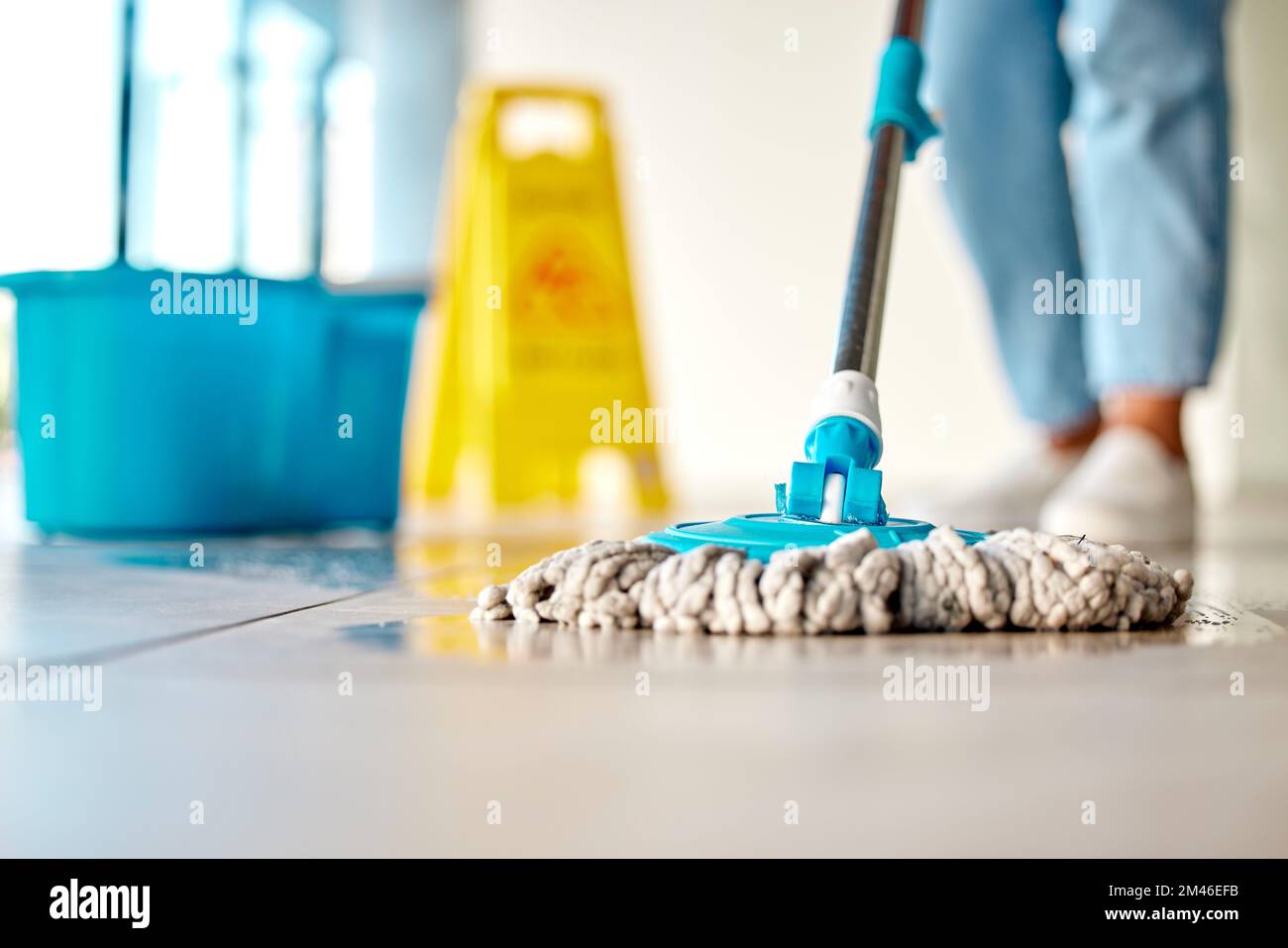 Mop, cleaner and washing wet floor for hygiene, disinfection or ...