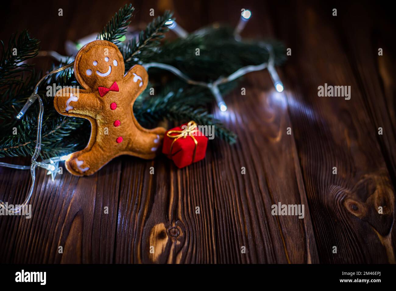 gingerbread Man on a vintage wooden table. Celebrating Christmas in a ...