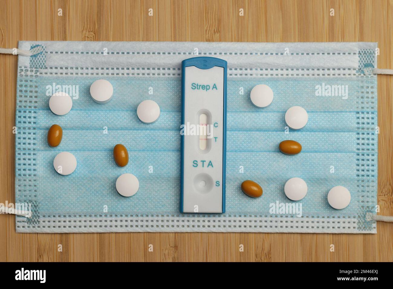 A quick test for group A streptococci with a positive result lies on a ...