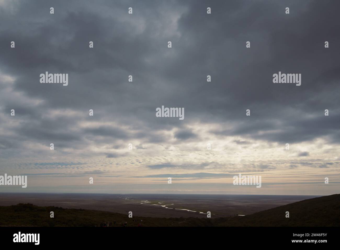River running across valley landscape photo Stock Photo - Alamy