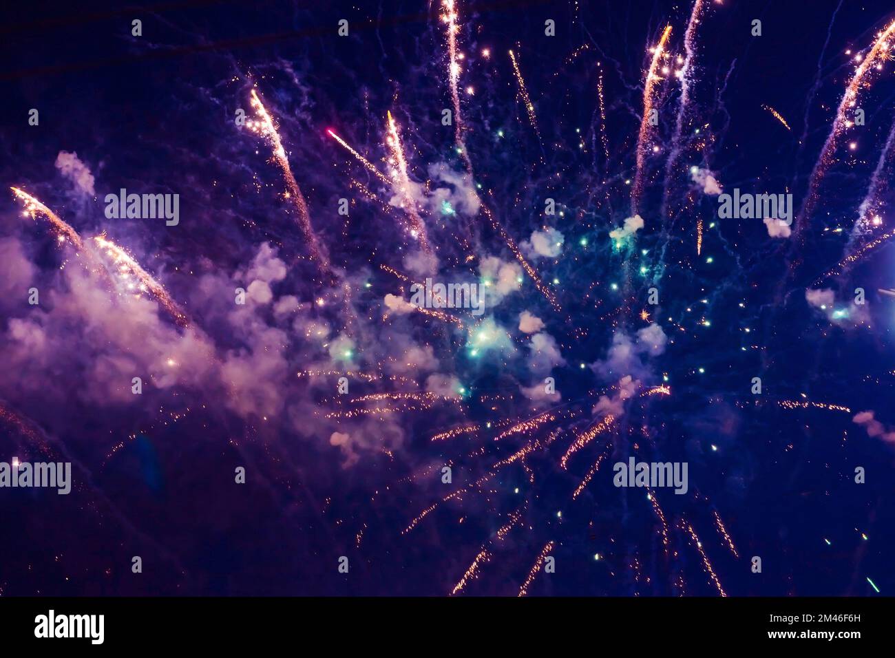 Bright, beautiful purple fireworks in the night sky Stock Photo - Alamy