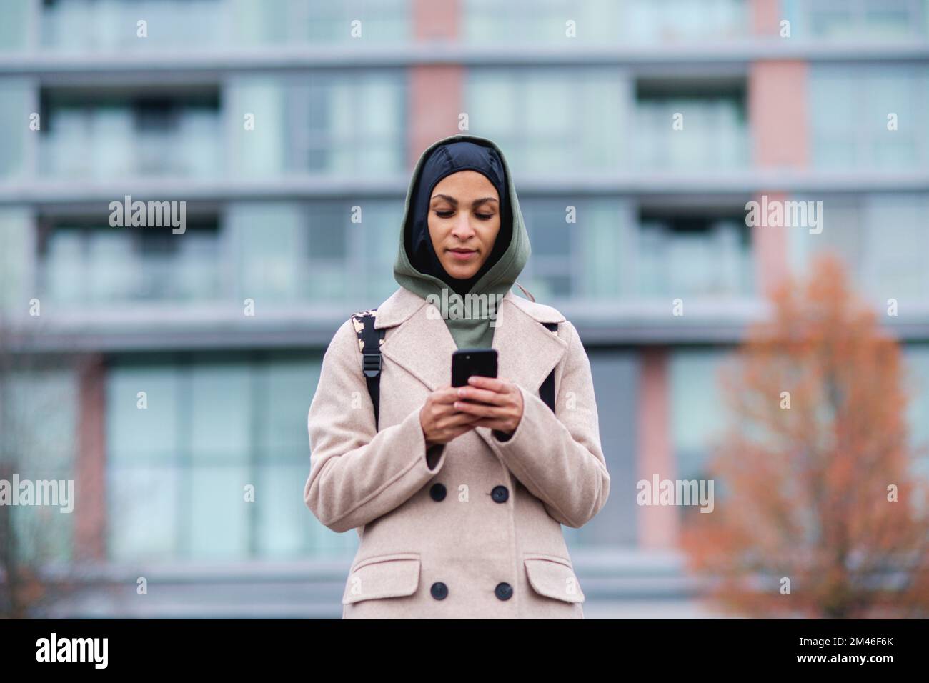 Woman scrolling phone hi-res stock photography and images - Alamy
