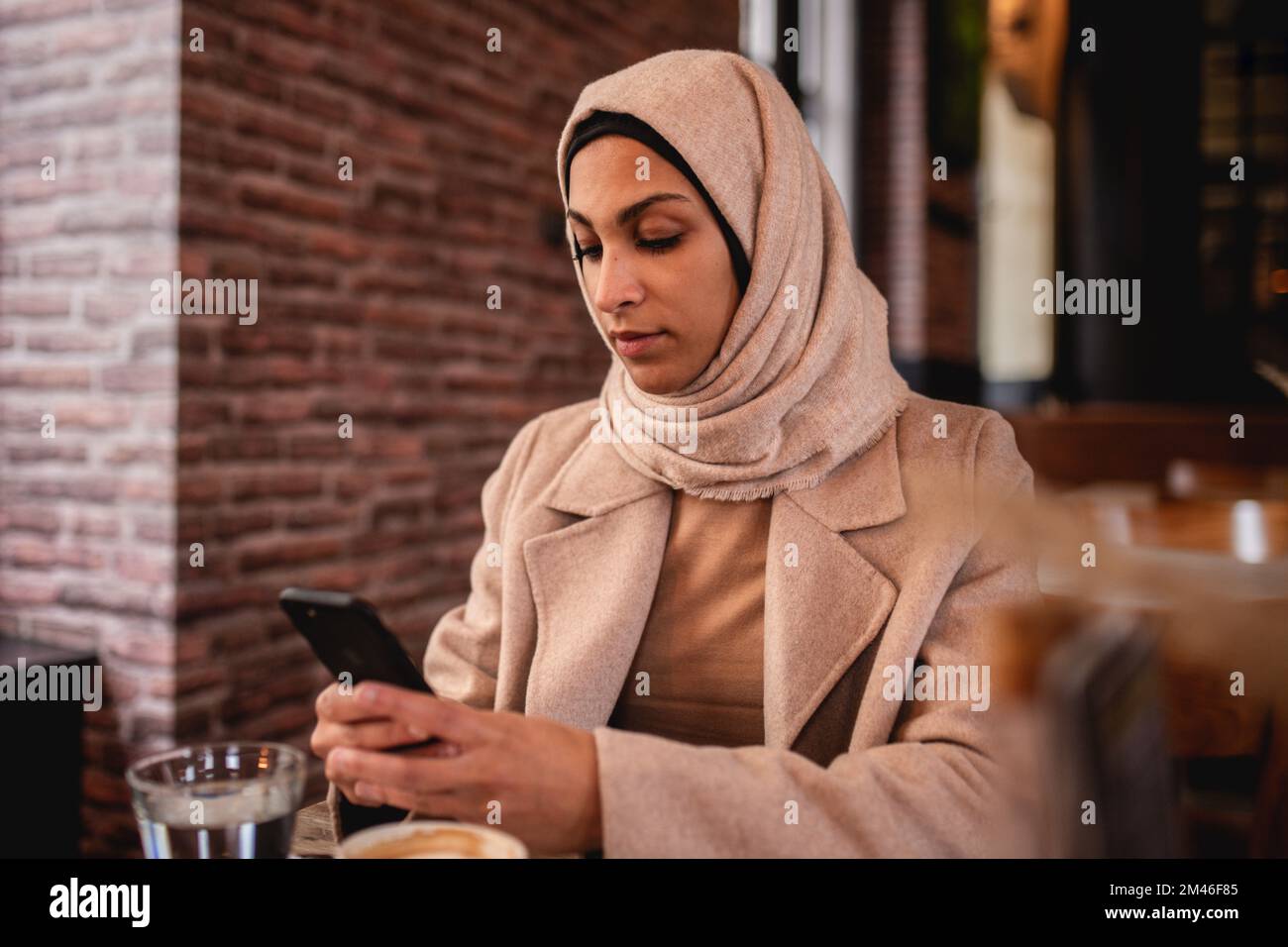 Woman scrolling phone hi-res stock photography and images - Alamy
