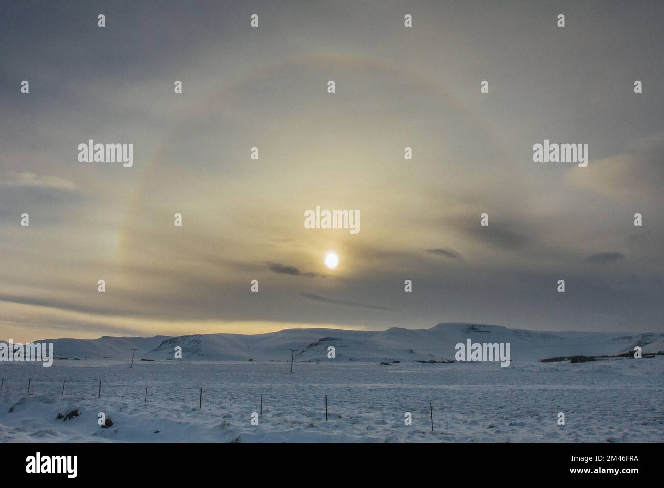Halo effect in cloudy sky landscape photo Stock Photo - Alamy