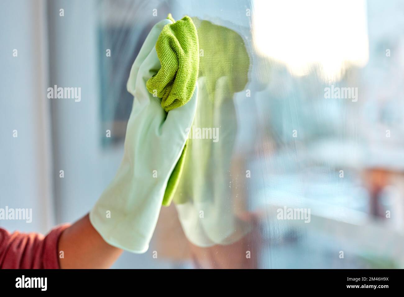 Hand, latex and cloth for window cleaning, hygiene or clean housework ...