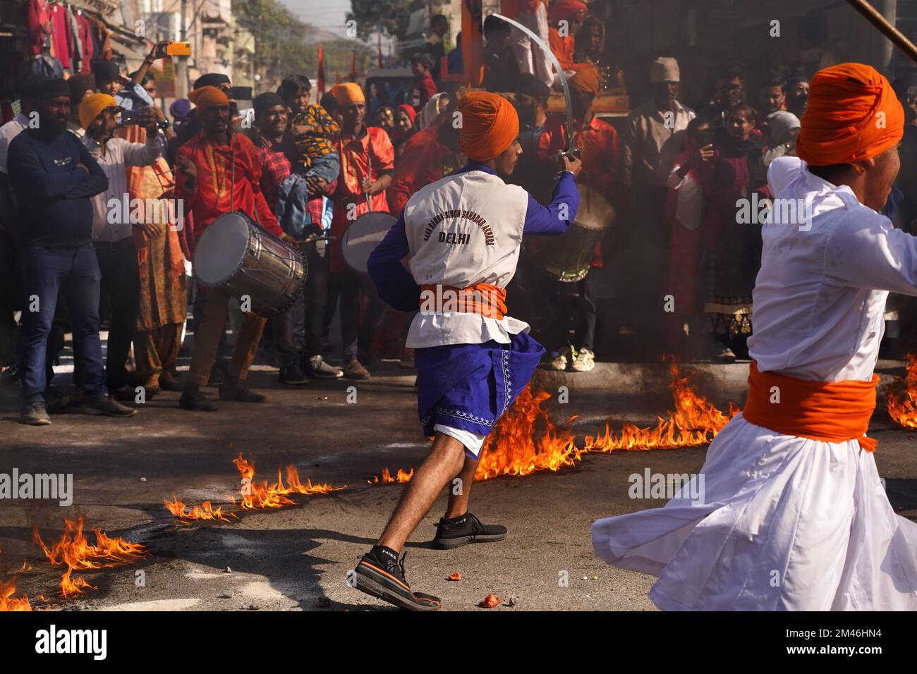 Indian Sikh demonstrates his traditional martial art skills during the ...