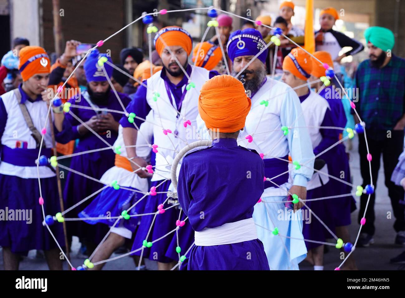 Indian Sikh demonstrates his traditional martial art skills during the ...