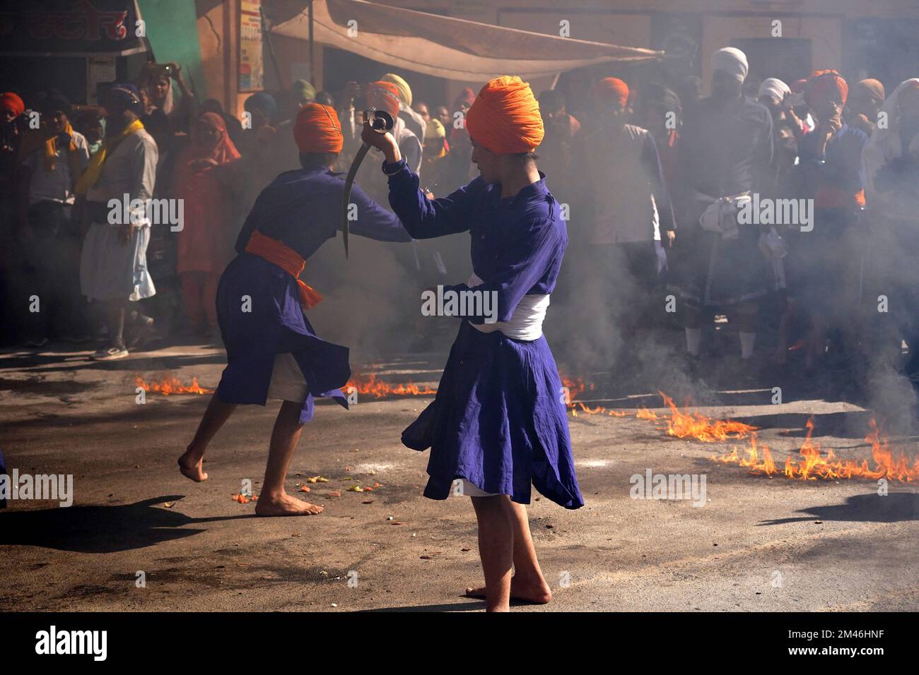 Indian Sikh demonstrates his traditional martial art skills during the ...