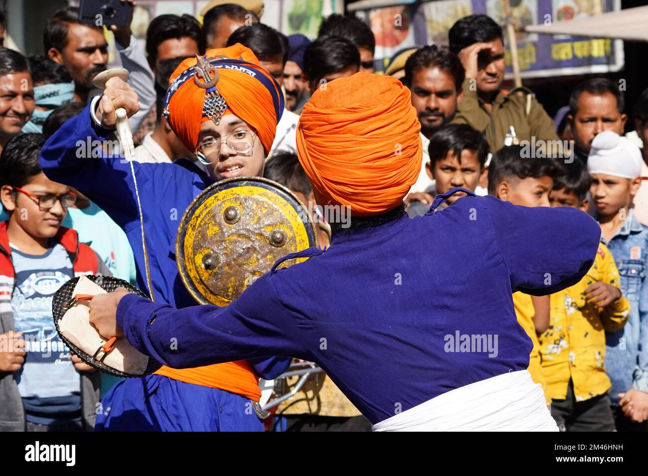 Indian Sikh demonstrates his traditional martial art skills during the ...