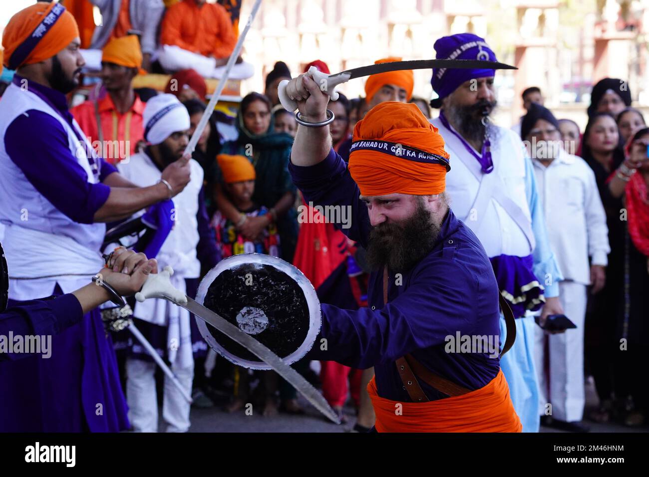 Indian Sikh demonstrates his traditional martial art skills during the ...