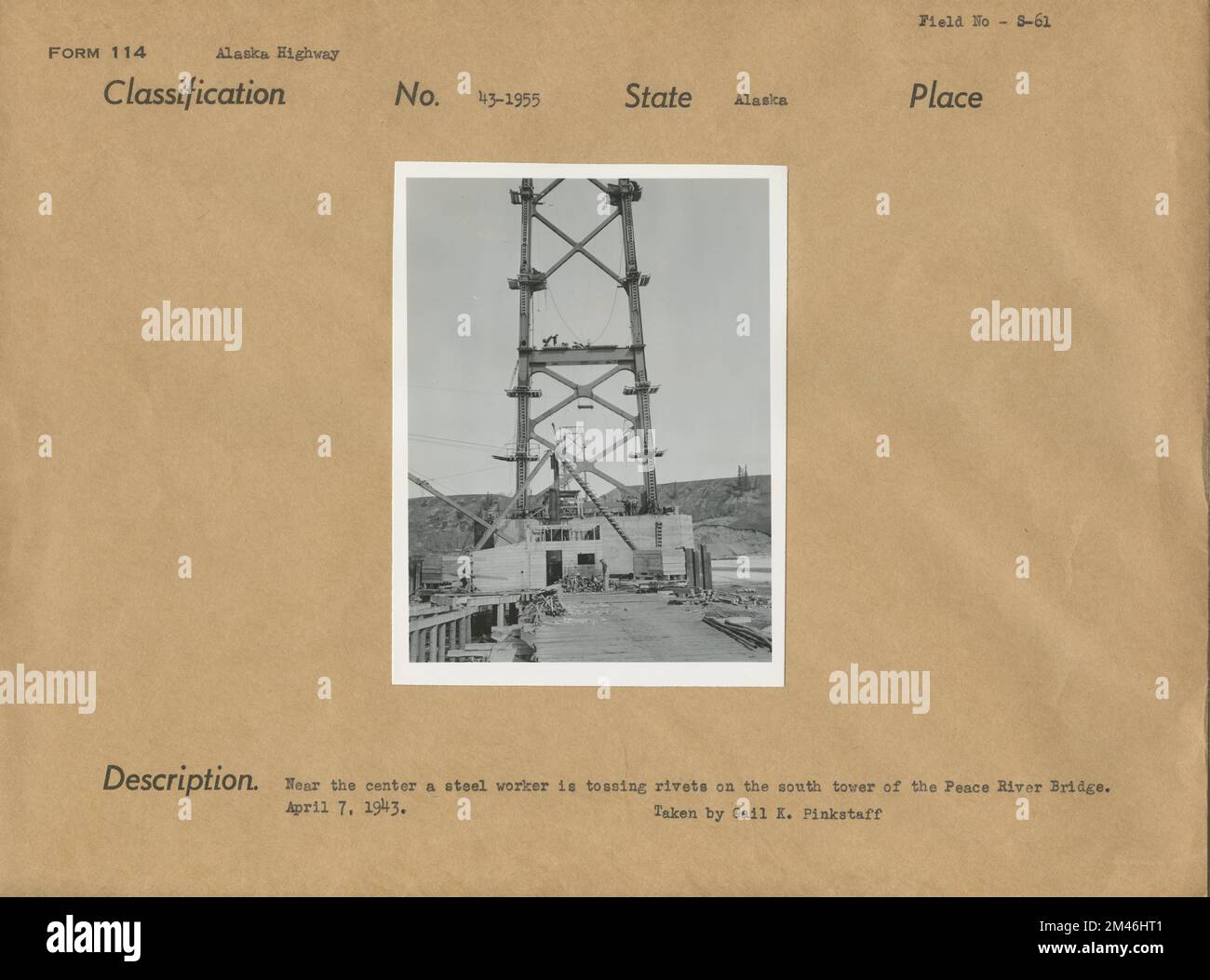 Steel Worker Tossing Rivets. Original caption: Near the center a steel ...