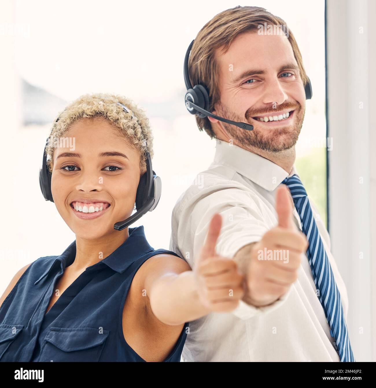 Thumbs up, call center success and employees with smile for ...