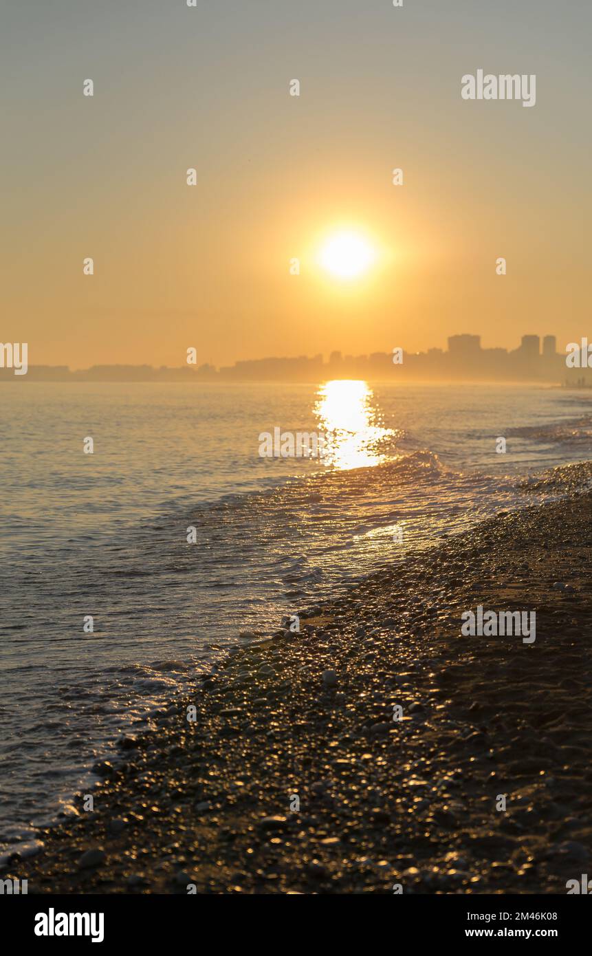 Pebbles at the Beach in the Light of Setting Sun Stock Photo - Alamy