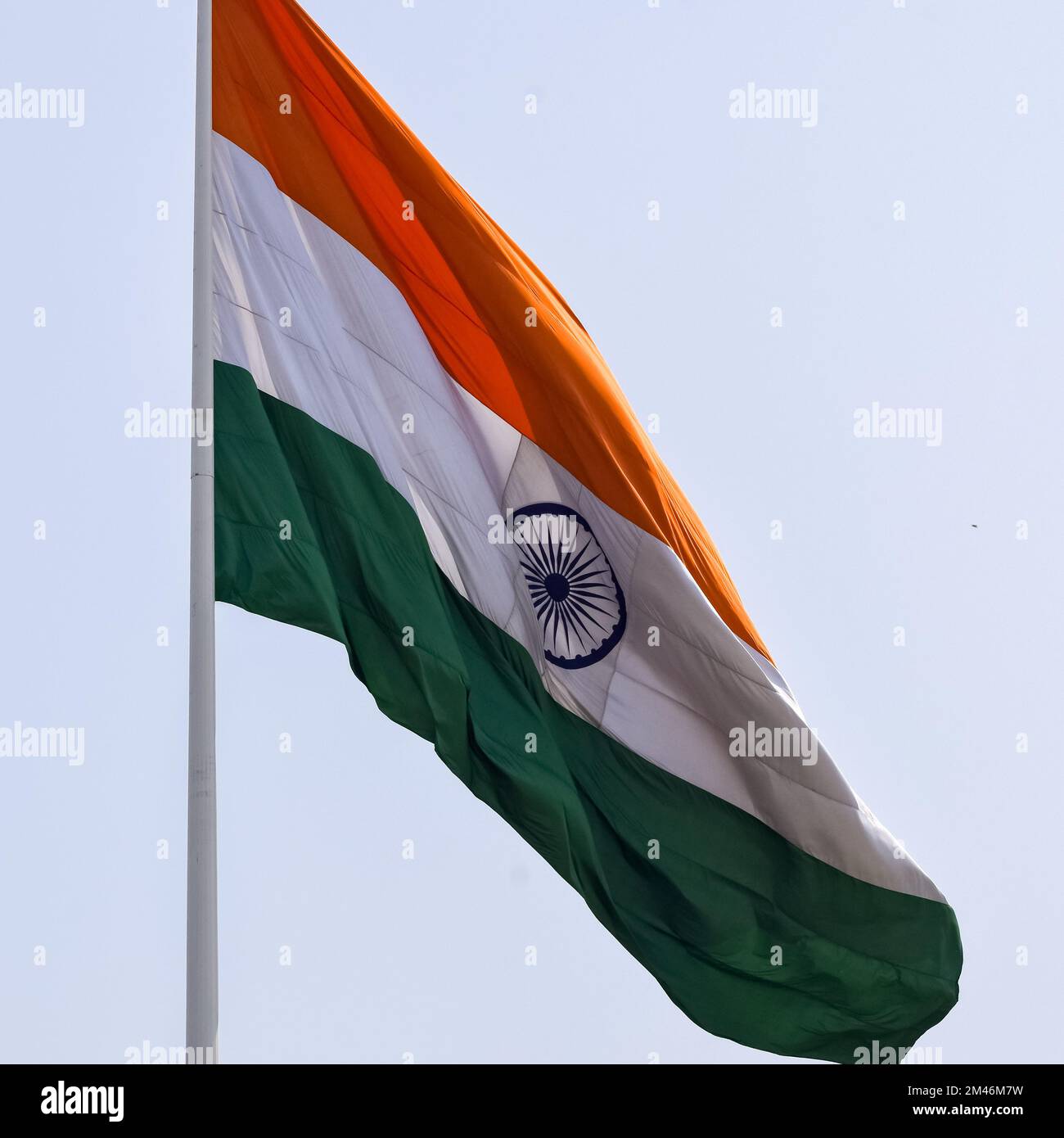 India flag flying high at Connaught Place with pride in blue sky, India ...