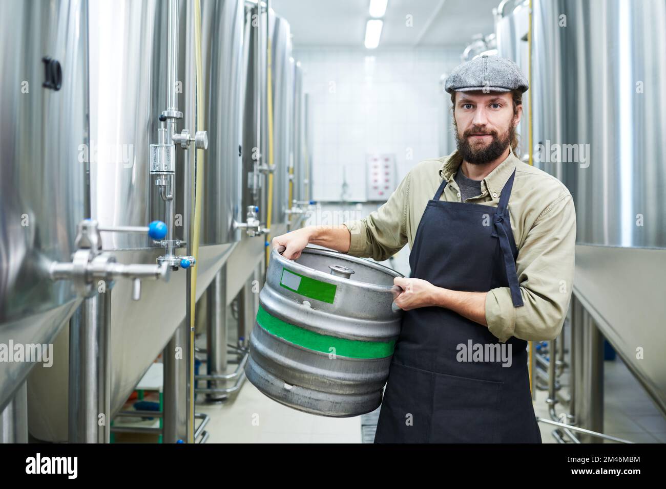 Food manufacturing uniform hi-res stock photography and images - Alamy