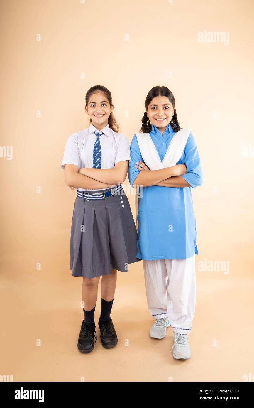 Happy Rural and Modern Indian student schoolgirls wearing school ...