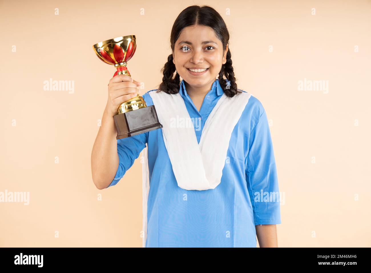Happy Rural Indian student schoolgirl wearing blue government school ...