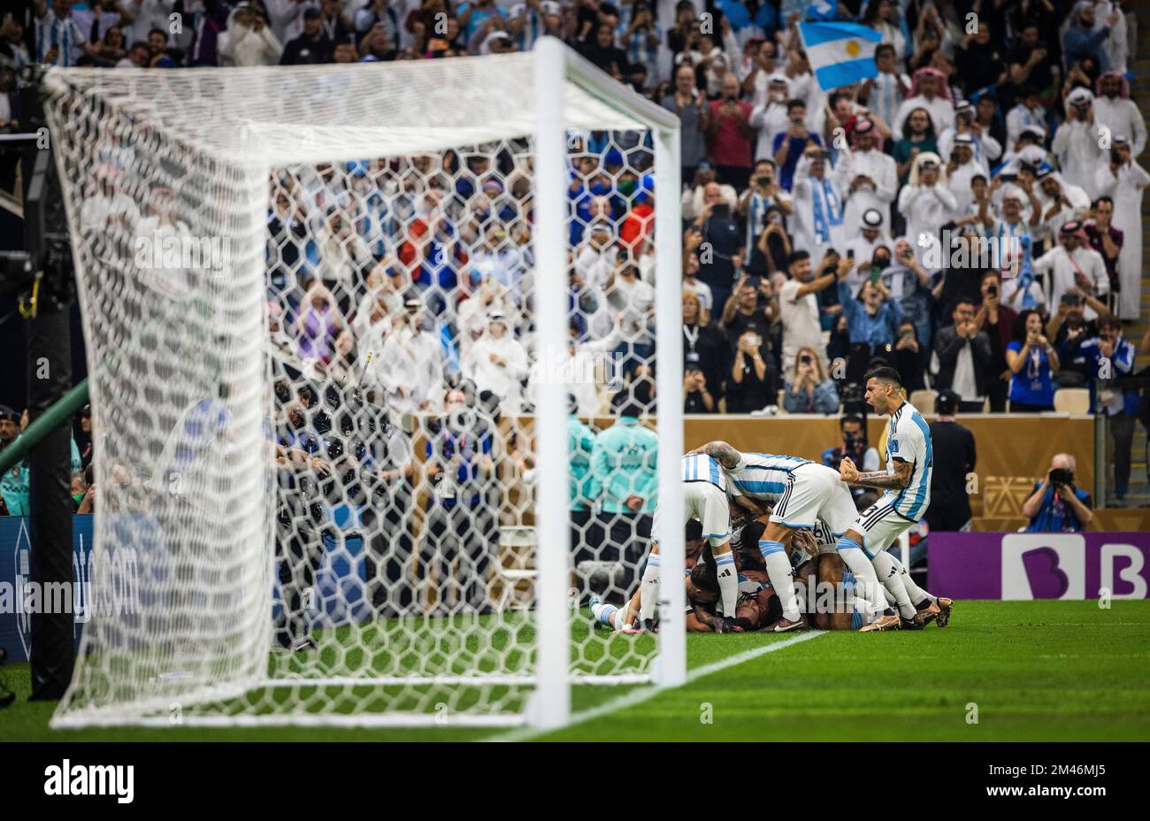 Doha, Qatar. 18th Dec, 2022. Players bury Lionel Messi (Arg) during ...