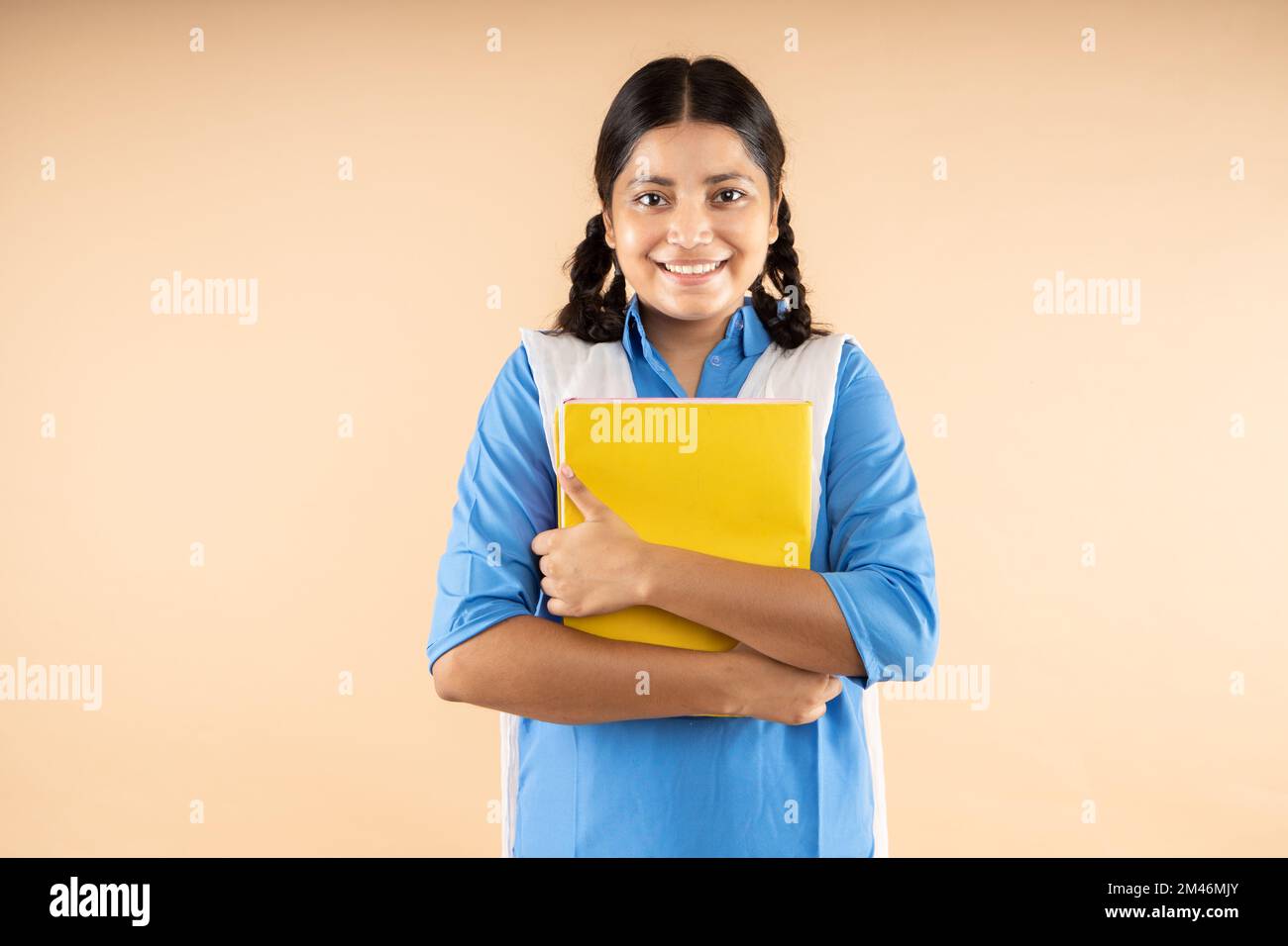 Happy Rural Indian student schoolgirl wearing blue government school ...