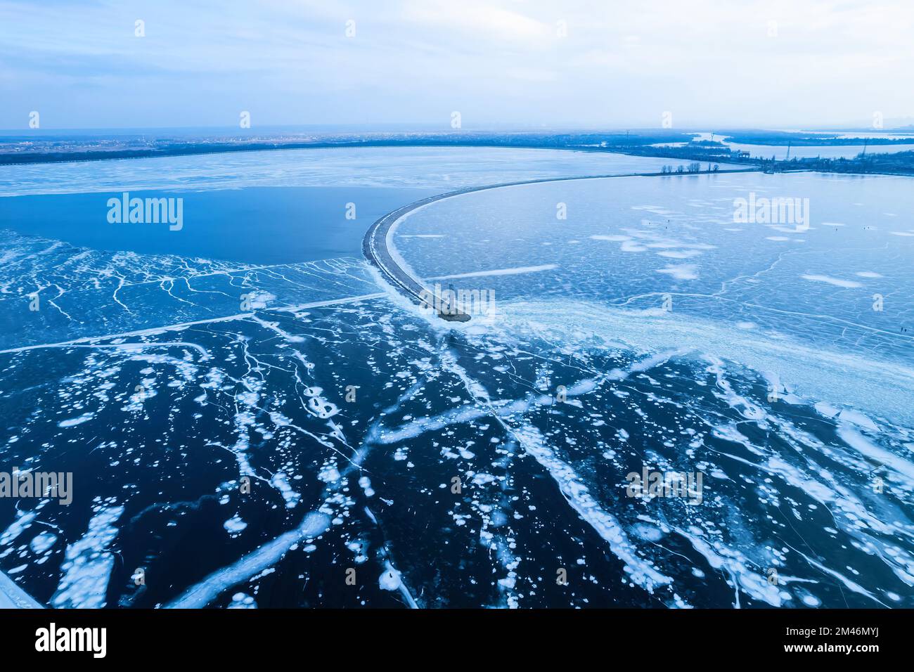 Breakwater leading into Baltic sea at winter. Sea covered in fog and ...