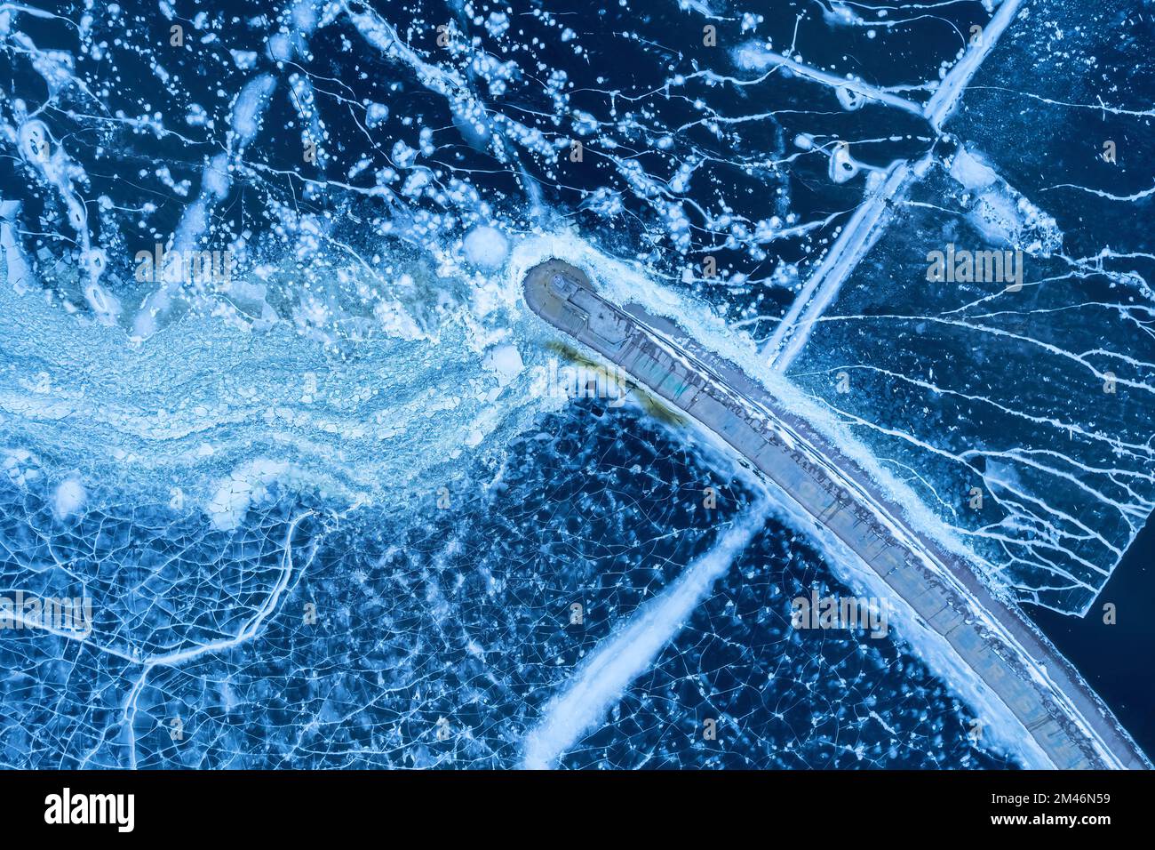 Breakwater leading into Baltic sea at winter. Sea covered in fog and ...