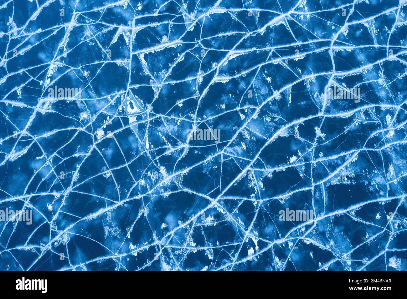 Aerial view of frozen lake. Ice from drone view. Background texture ...