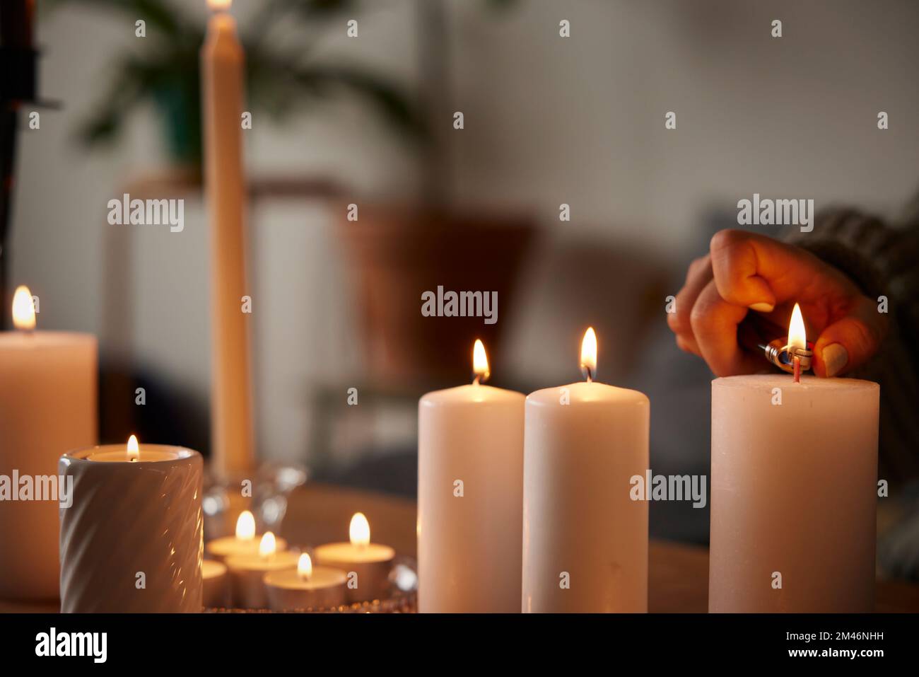 Lighting domestic candle hi-res stock photography and images - Alamy