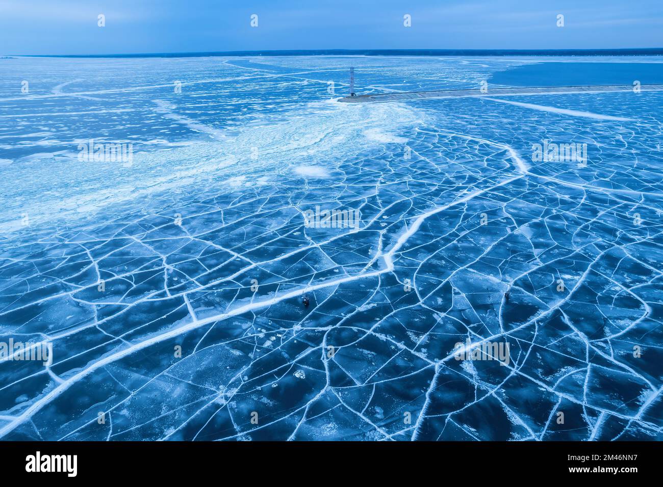 Aerial view of frozen lake. Ice from drone view. Background texture ...
