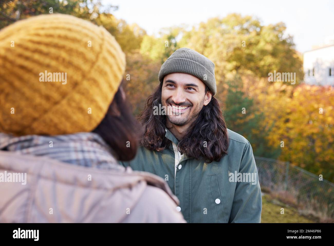 Happy couple in autumn scenery Stock Photo - Alamy