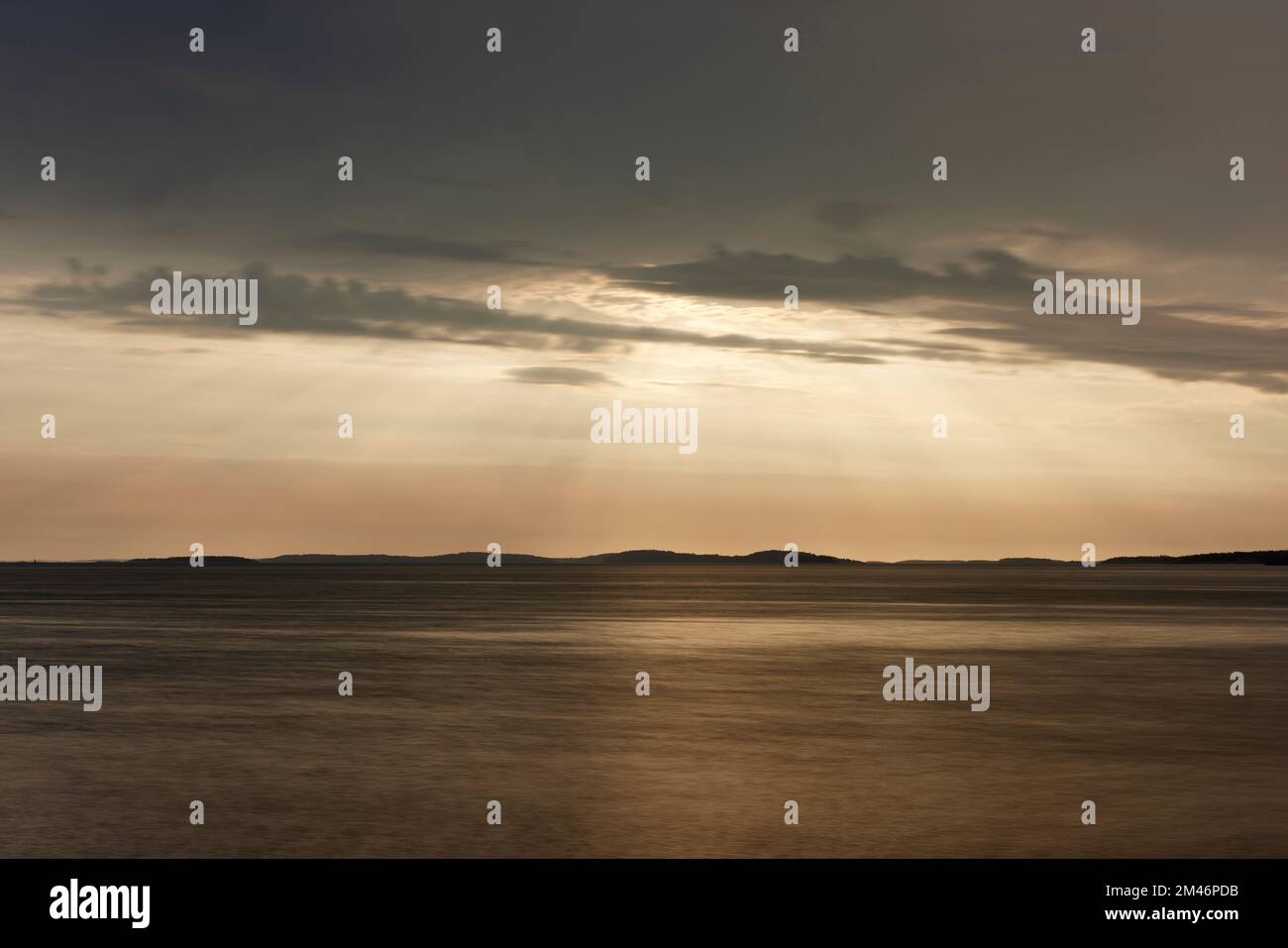 View of sunset over sea Stock Photo - Alamy