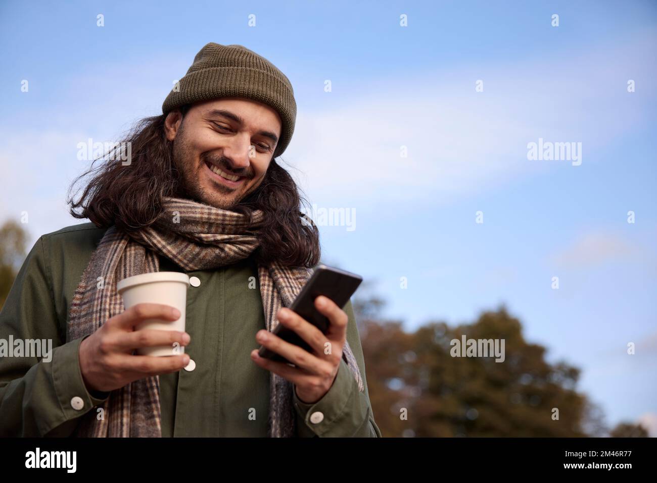 Man using cell phone Stock Photo - Alamy