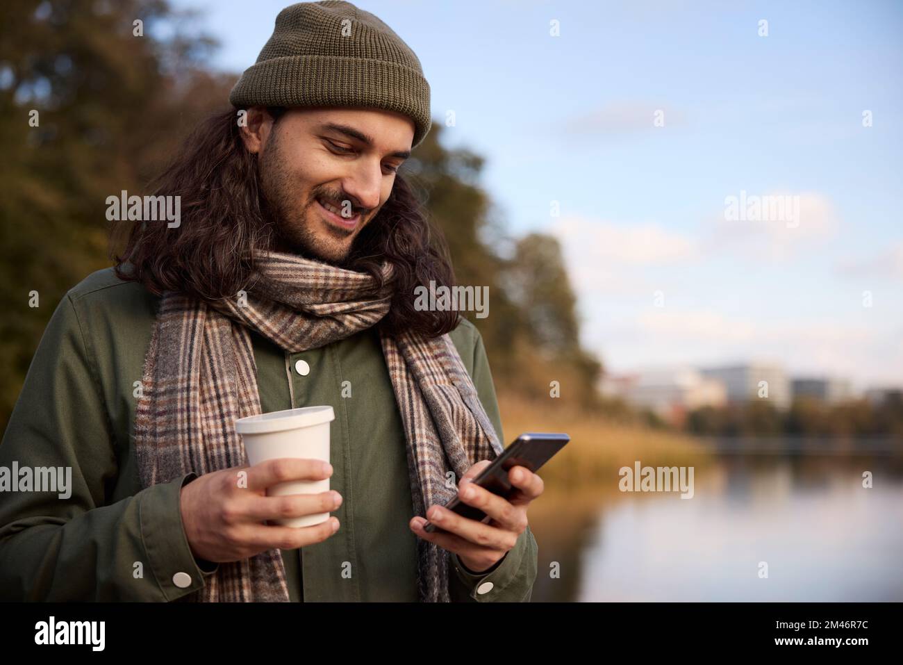 Man using cell phone Stock Photo - Alamy