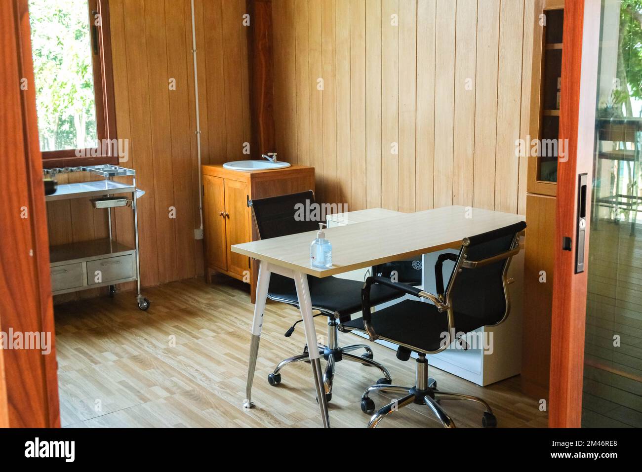 Medical professional workspace with table and first aid equipment in ...