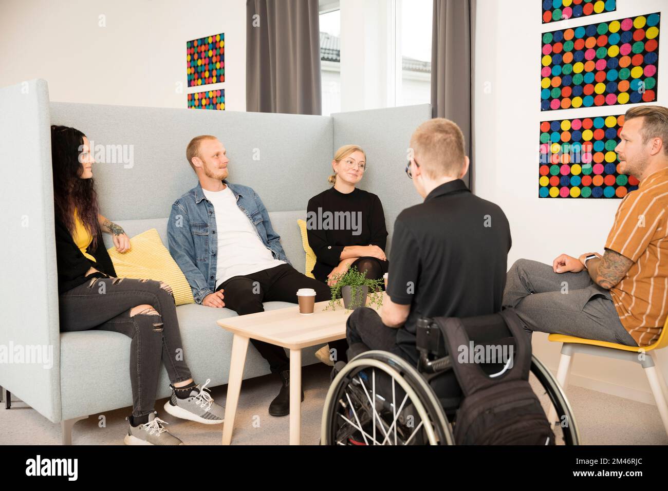 Students resting in cafeteria Stock Photo - Alamy