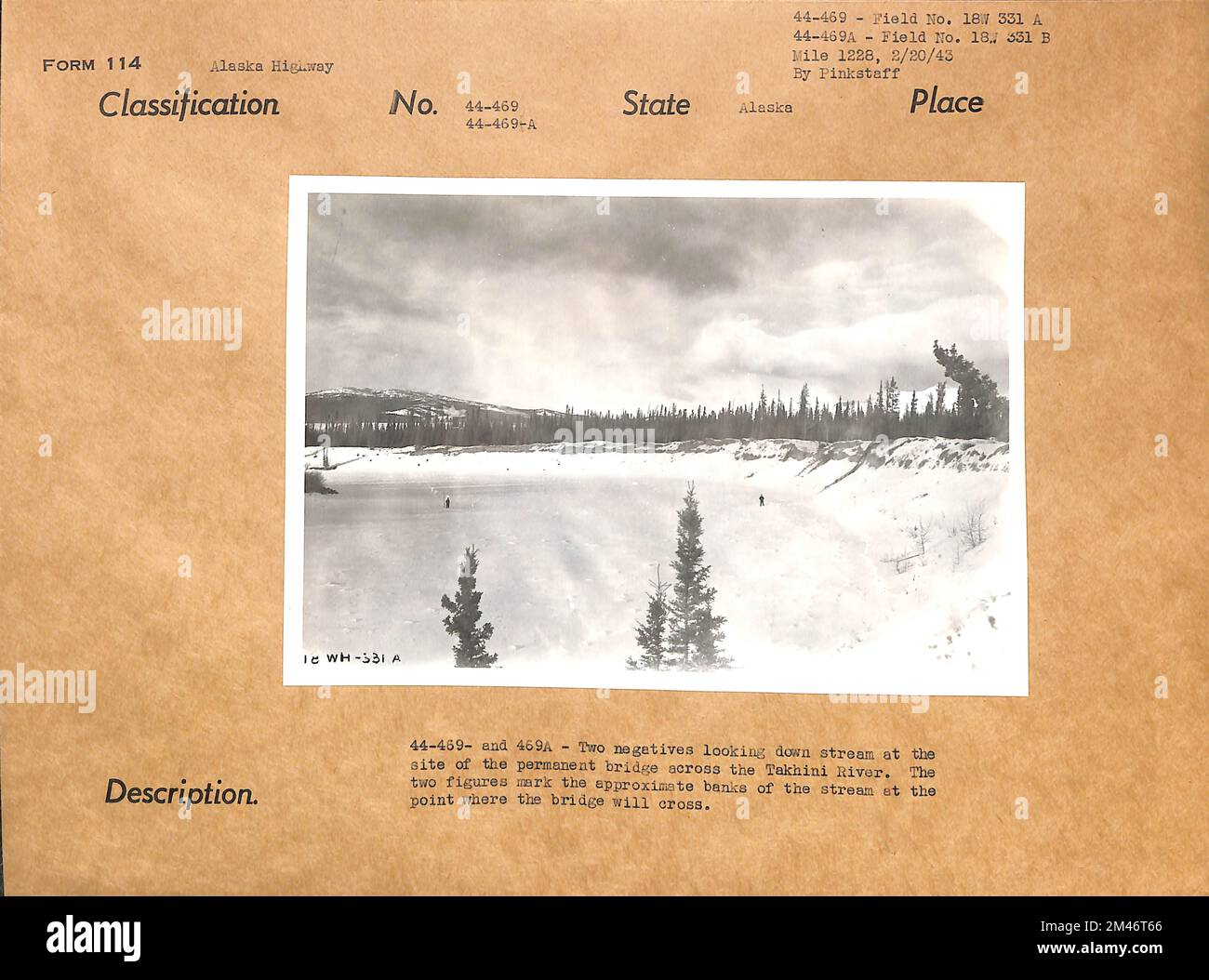 Looking down stream at the site of the permanent bridge across the Takhini River. Original ...