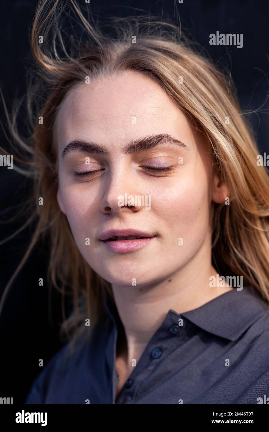 Mature woman windblown hair hi-res stock photography and images - Alamy