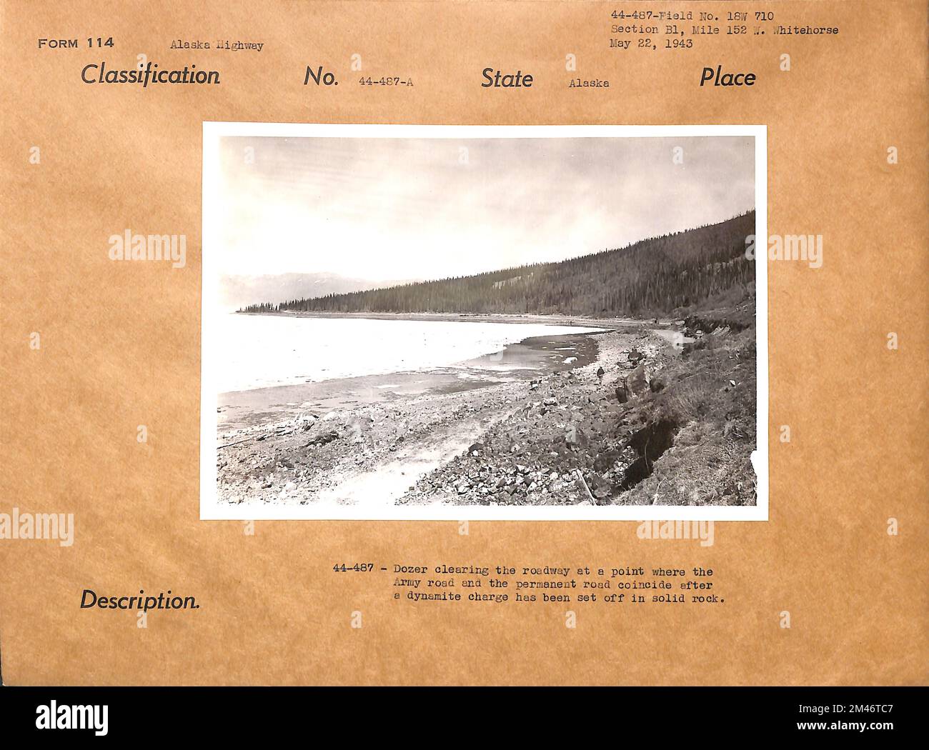 Dozer clearing the roadway at a point where the Army road and the ...