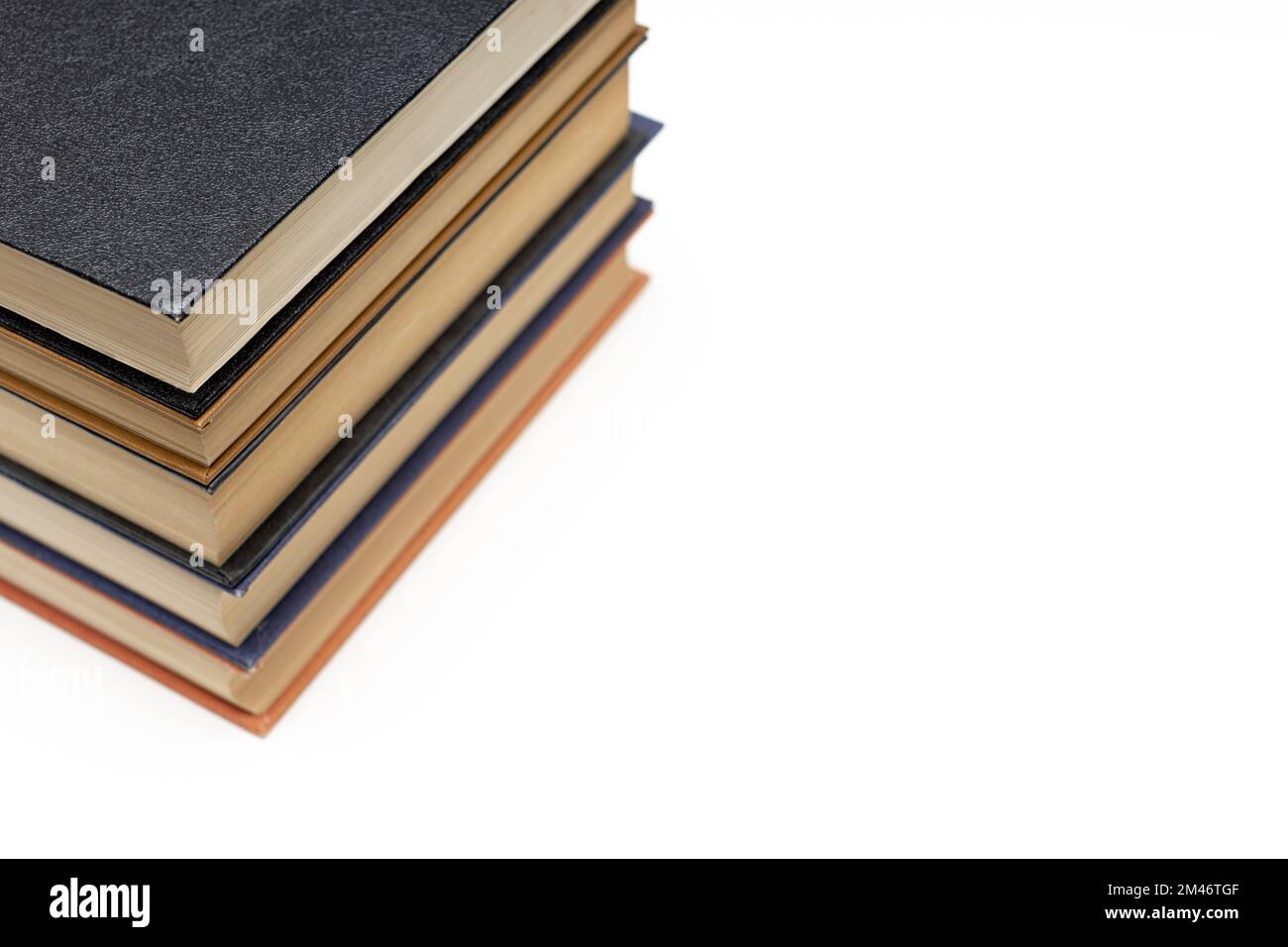 a stack of old books lies on the table. Old book. yellow book page ...