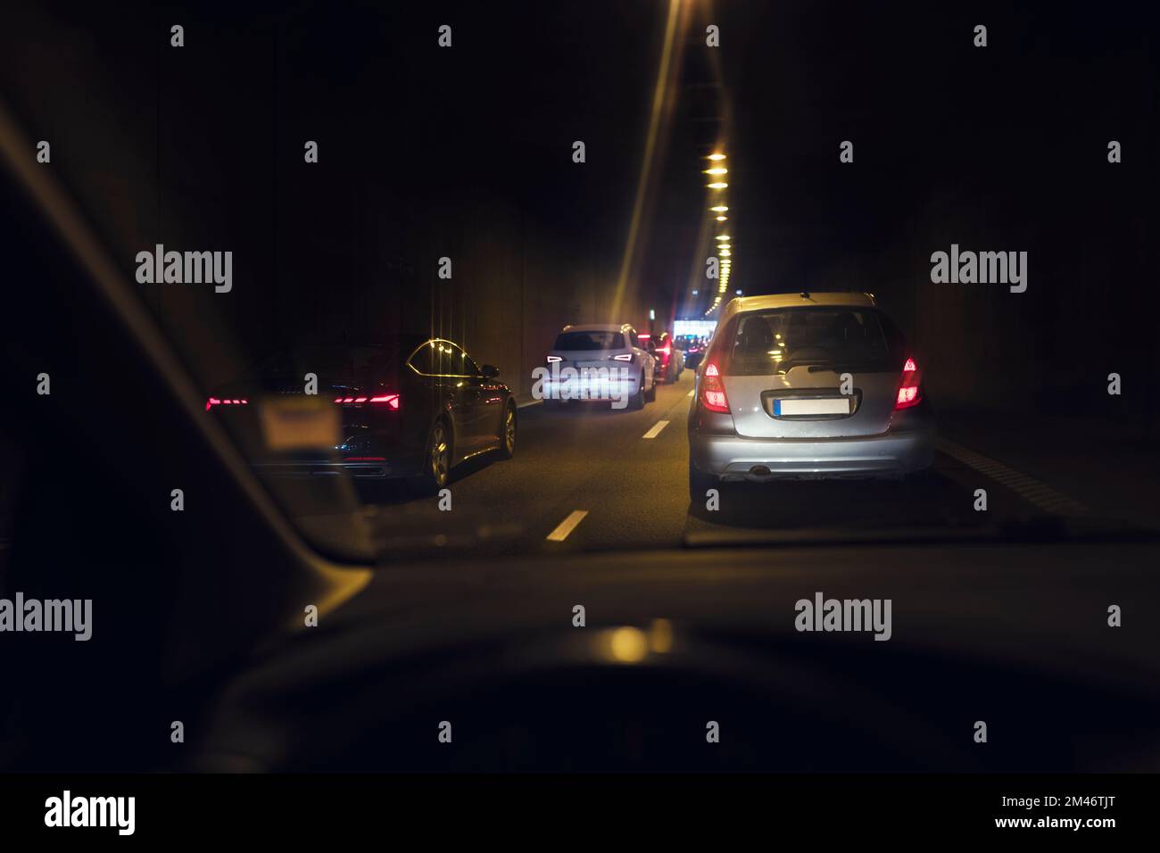 Heavy car traffic in tunnel Stock Photo - Alamy