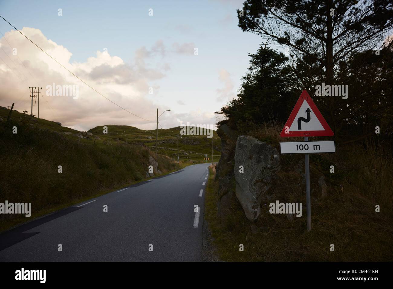 Warning sign at country road Stock Photo - Alamy